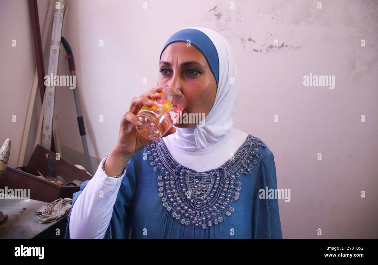 Gaza, Palestine. 3rd Sep, 2024. (INT) Palestinian Enas Al-Ghoul worked ...