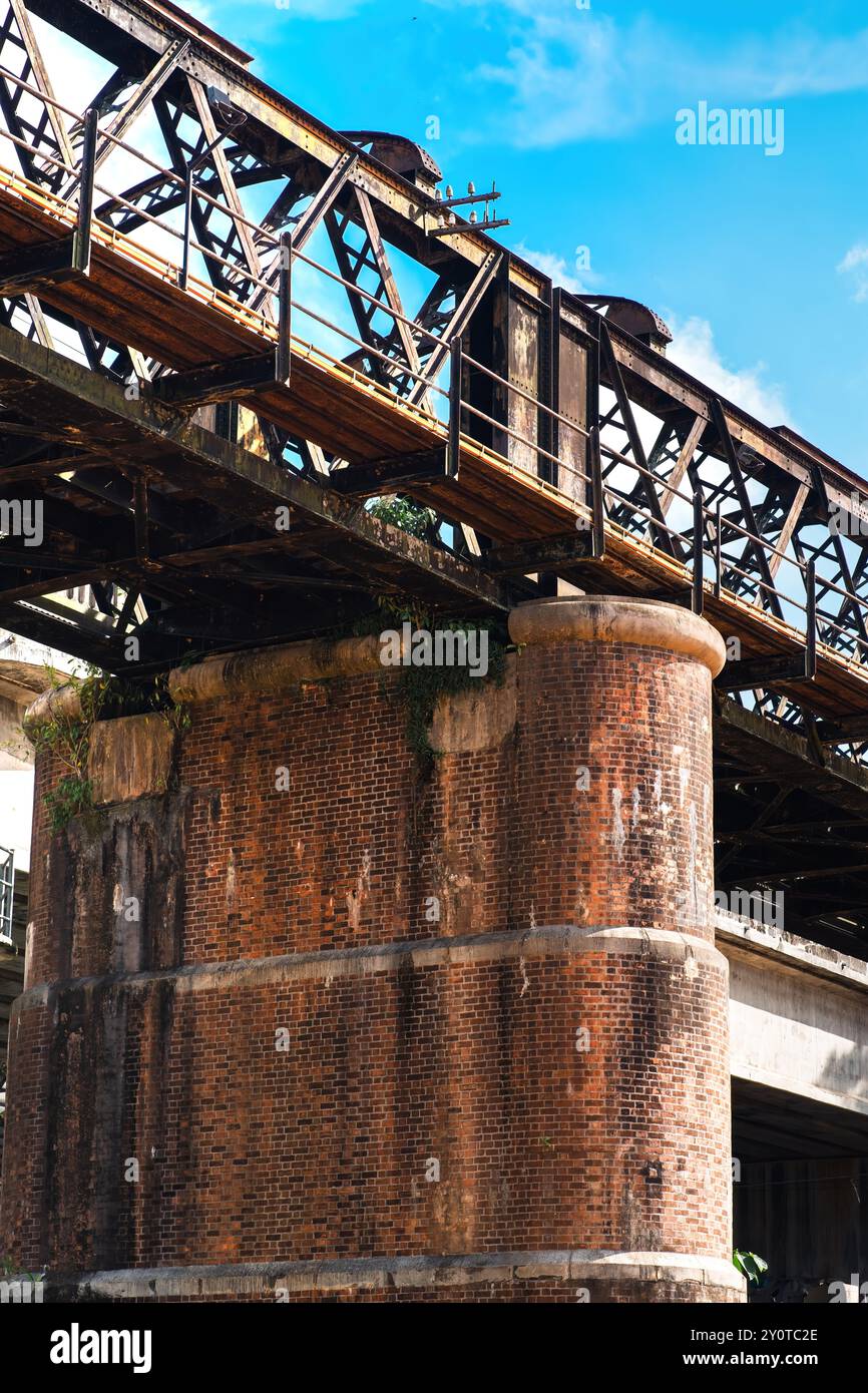 A large brick and stone masonry arch bridge over the Kuala Kangsar ...
