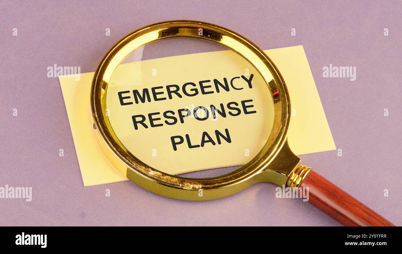 ERP as EMERGENCY RESPONSE PLAN written through a magnifying glass on ...