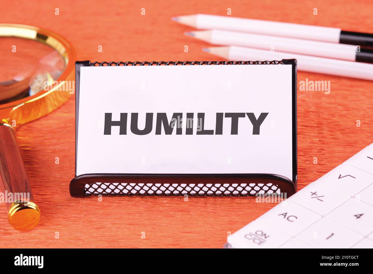 Lifestyle concept. HUMILITY word on a white business card, close-up in ...
