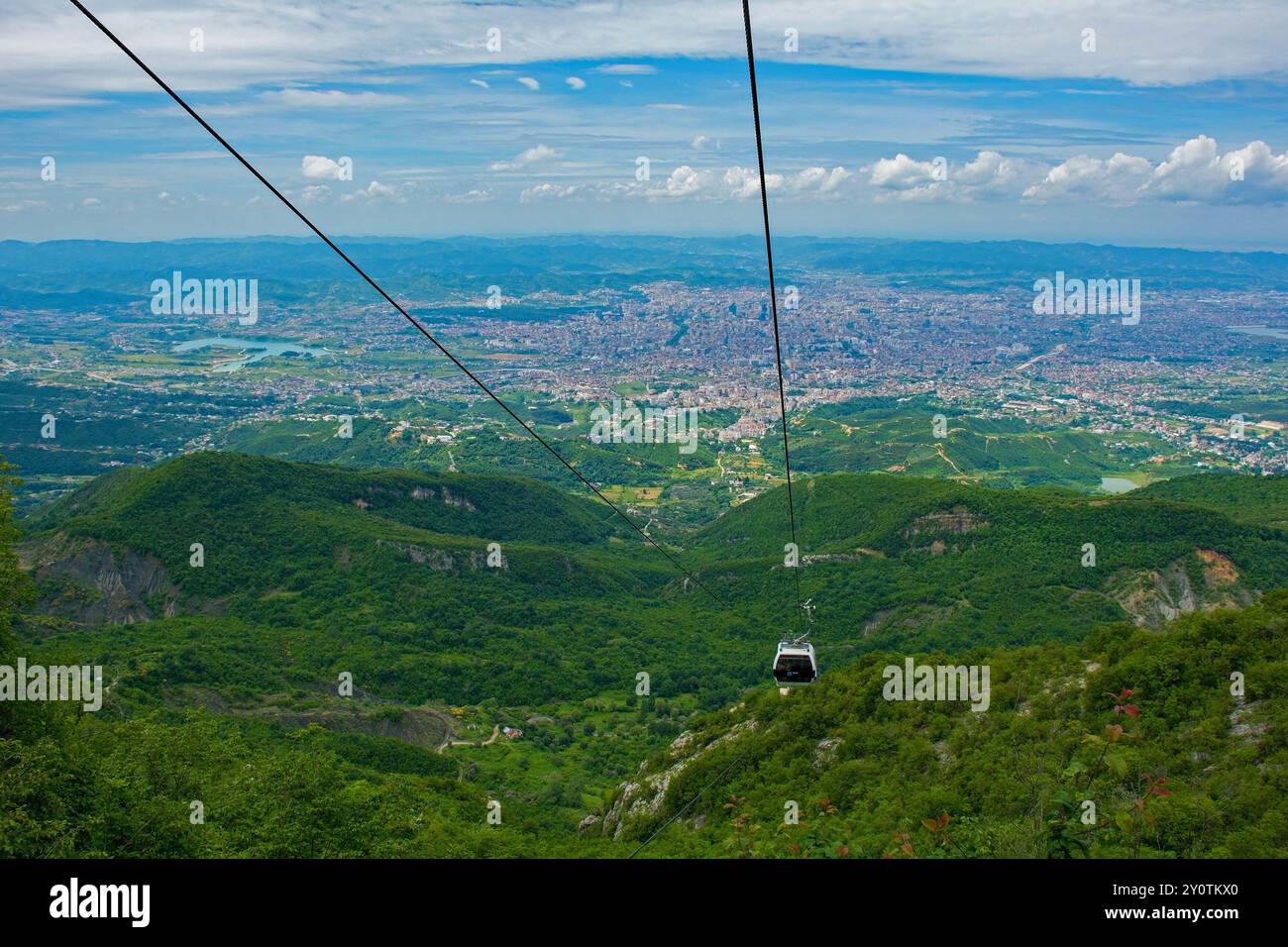 Tirana, Albania - May 31 2024. A cable car ascends Mount Dajti from the ...