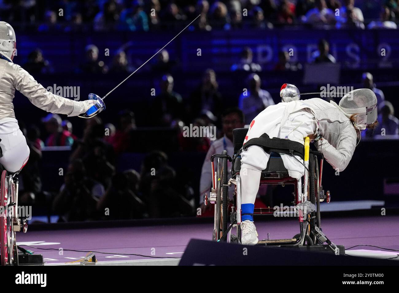 Paris, France. 3rd Sep, 2024. Gu Haiyan (R) of China competes during ...