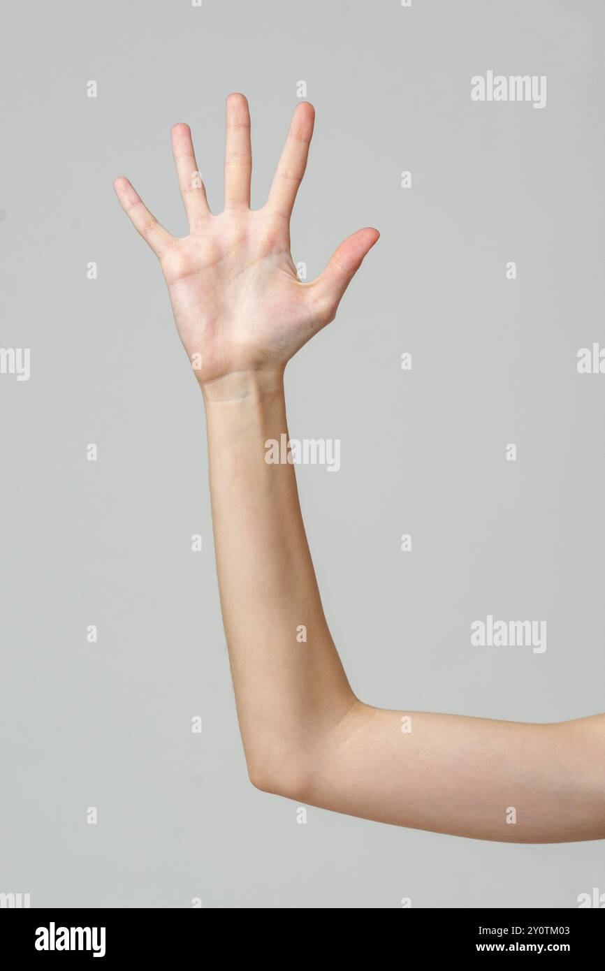 Human arm extended upward hi-res stock photography and images - Alamy