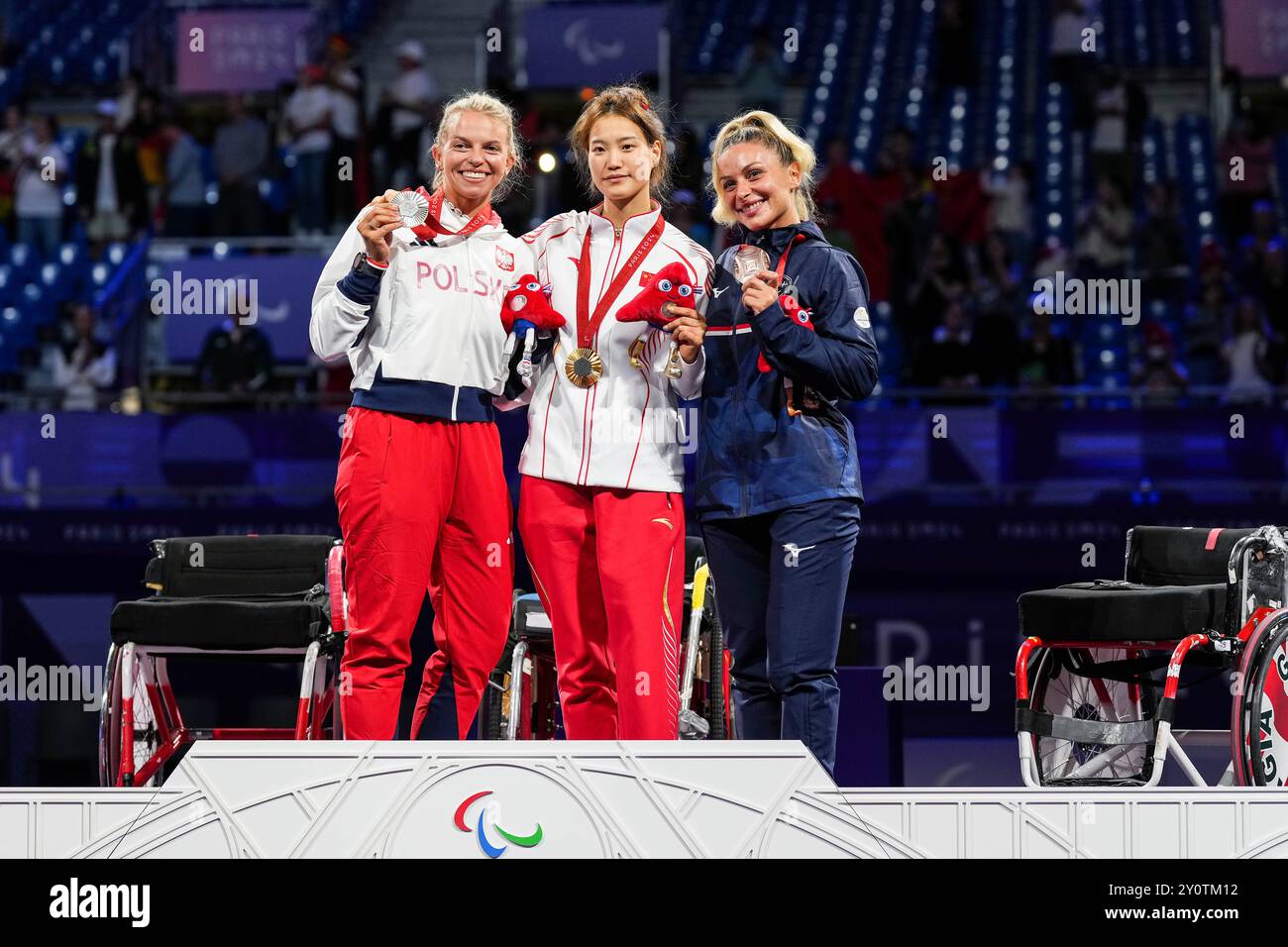 Paris, France. 3rd Sep, 2024. Gold medalist Gu Haiyan (C) of China ...