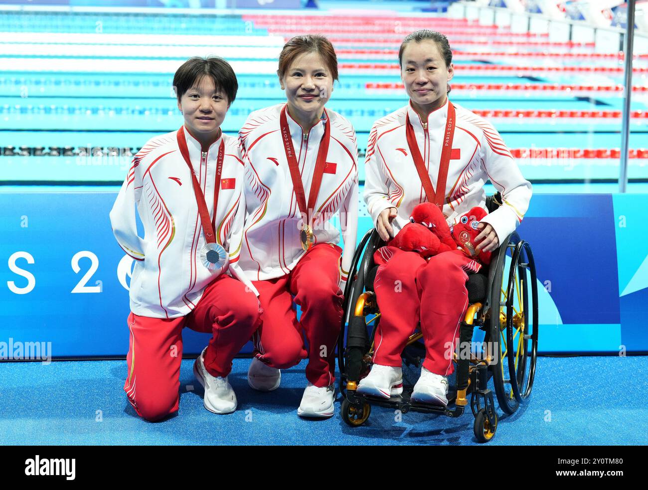 Paris, France. 3rd Sep, 2024. China's Lu Dong (C), He Shenggao (L) and ...