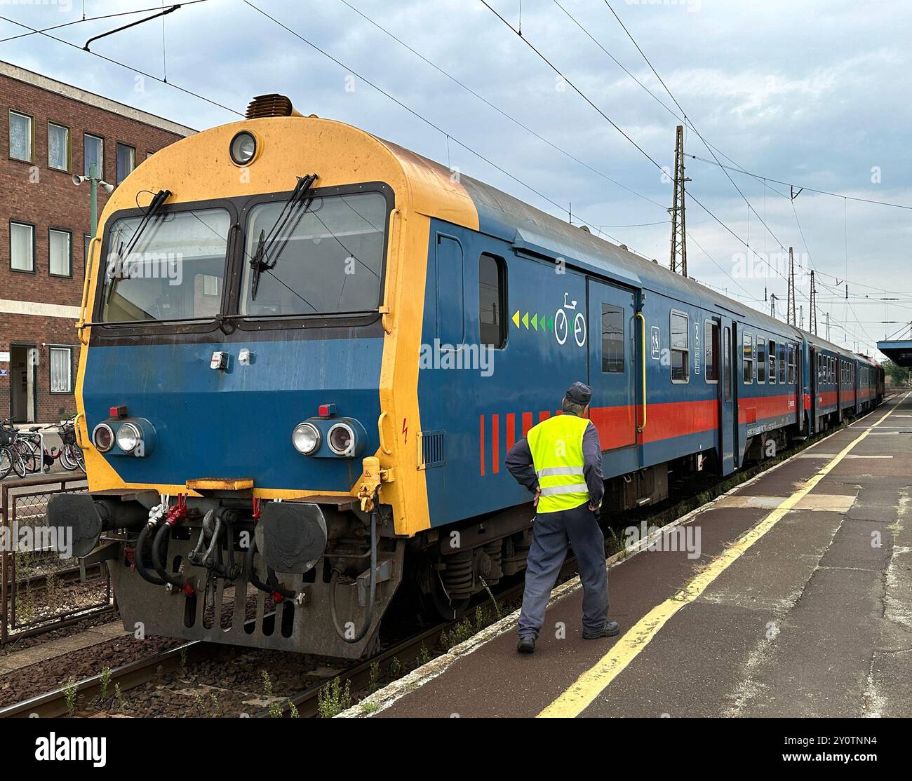 Passenger train at the station platform Stock Photo - Alamy