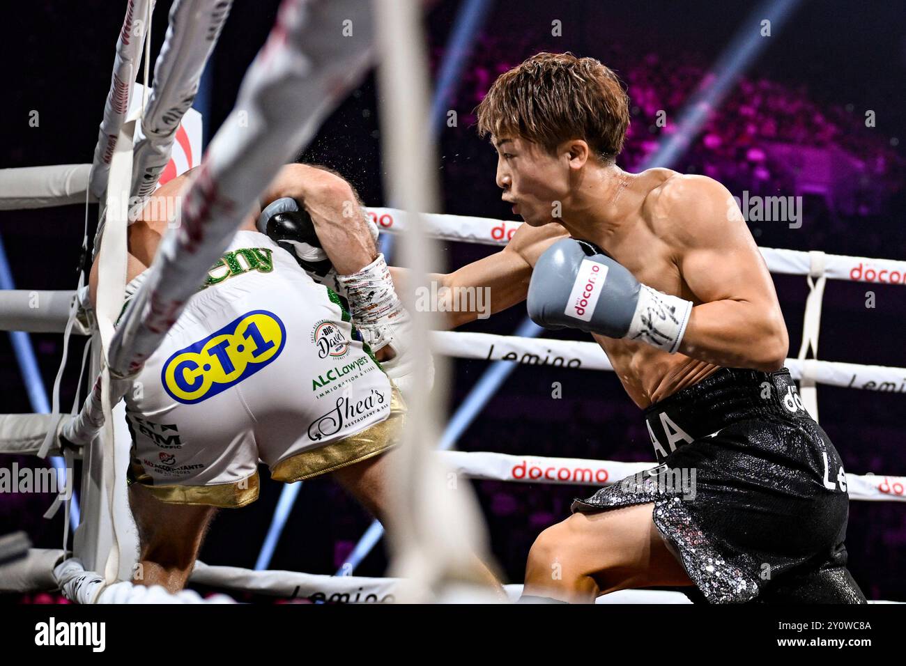 Champion Naoya Inoue (R) of Japan and challenger TJ Doheny of Ireland compete during their IBF ...