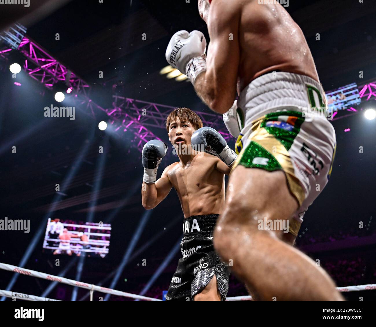 Champion Naoya Inoue (L) of Japan and challenger TJ Doheny of Ireland compete during their IBF ...