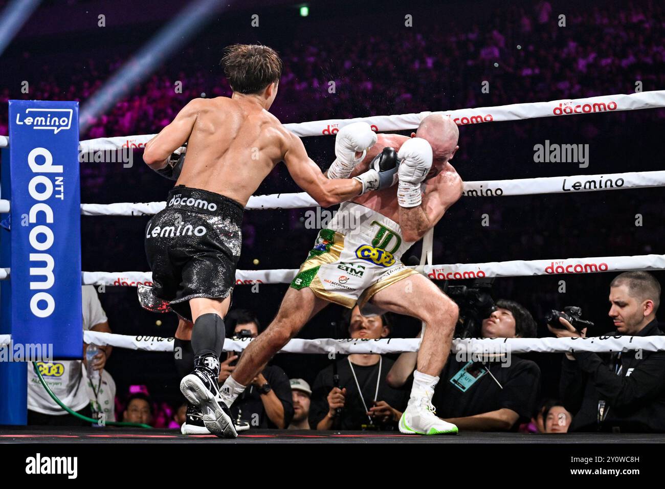 Champion Naoya Inoue (L) of Japan and challenger TJ Doheny of Ireland compete during their IBF ...