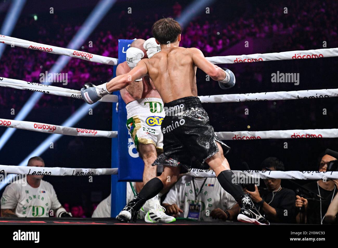 Champion Naoya Inoue of Japan and challenger TJ Doheny of Ireland compete during their IBF-WBA ...