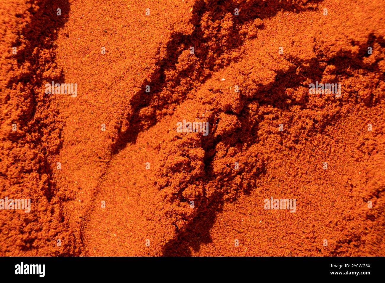 Ground paprika, red terracotta spice background, art in cooking Stock ...