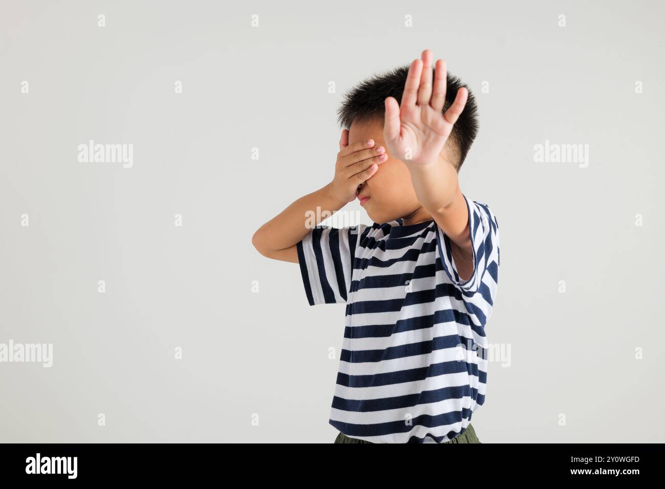 Stop hand of primary child. Asian little kid boy doing stop sing ...
