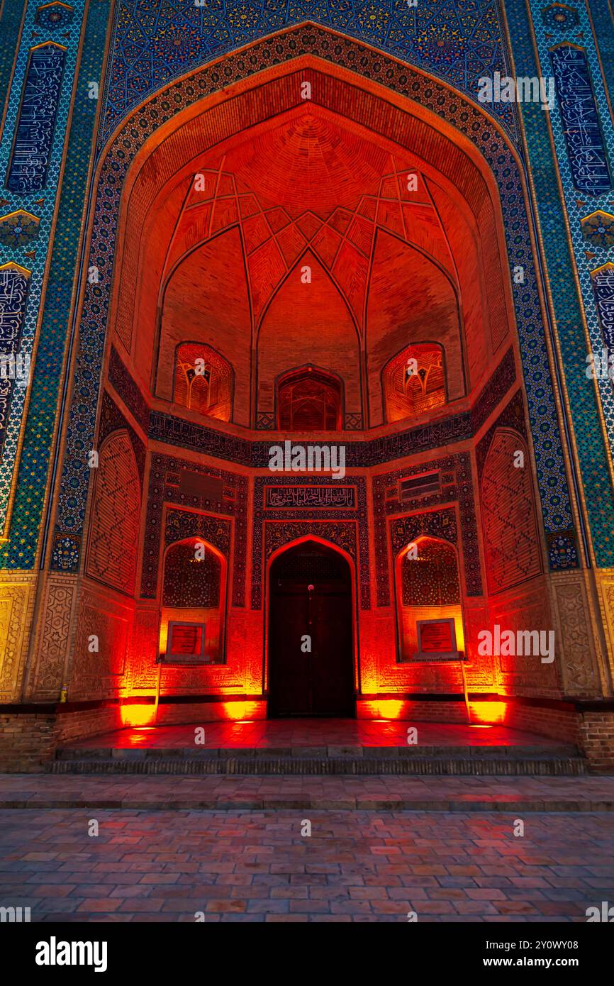 The ancient Kalyan mosque in night illumination. Fabulous Arabian night ...