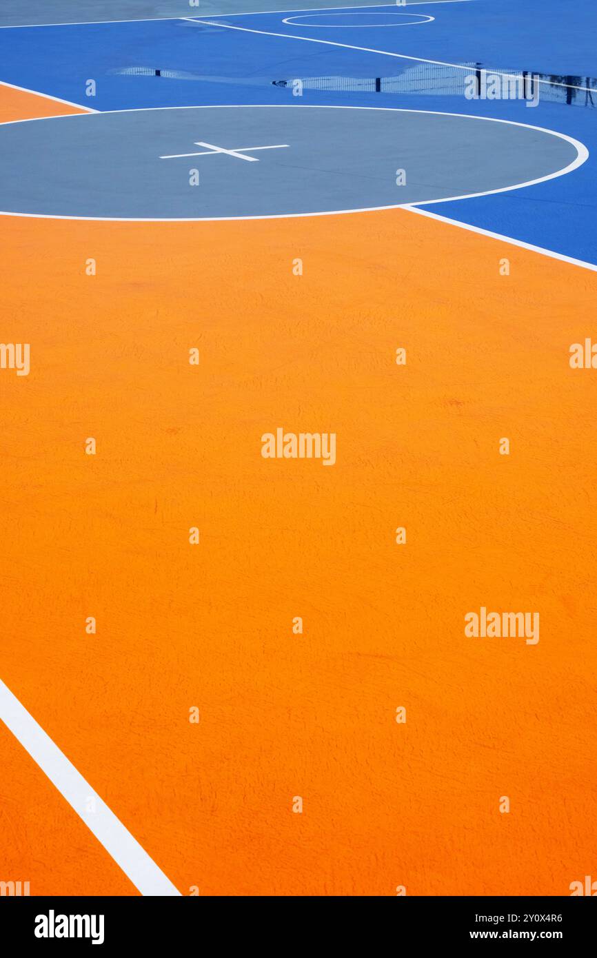 Colorful outdoor basketball court with vibrant markings Stock Photo - Alamy