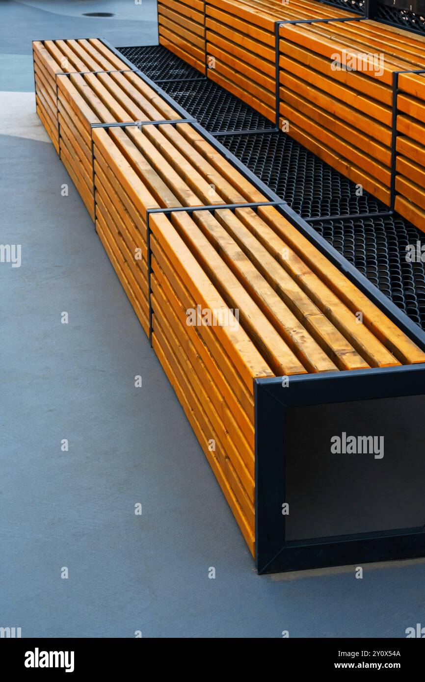 Modern wooden benches on the outdoor basketball court Stock Photo - Alamy