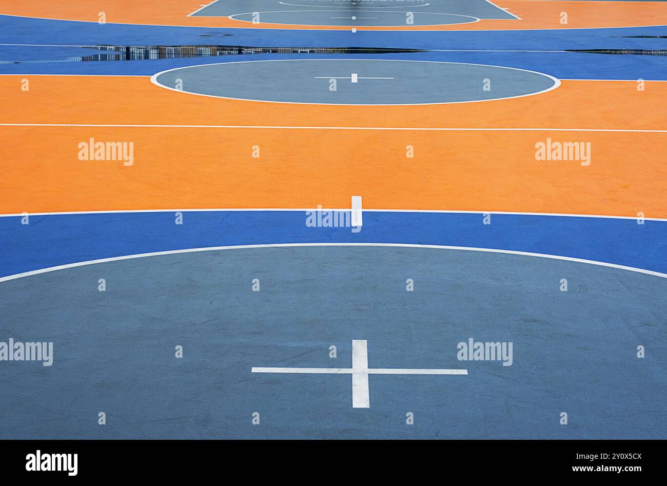 Colorful outdoor basketball court with geometric patterns. Concept of ...