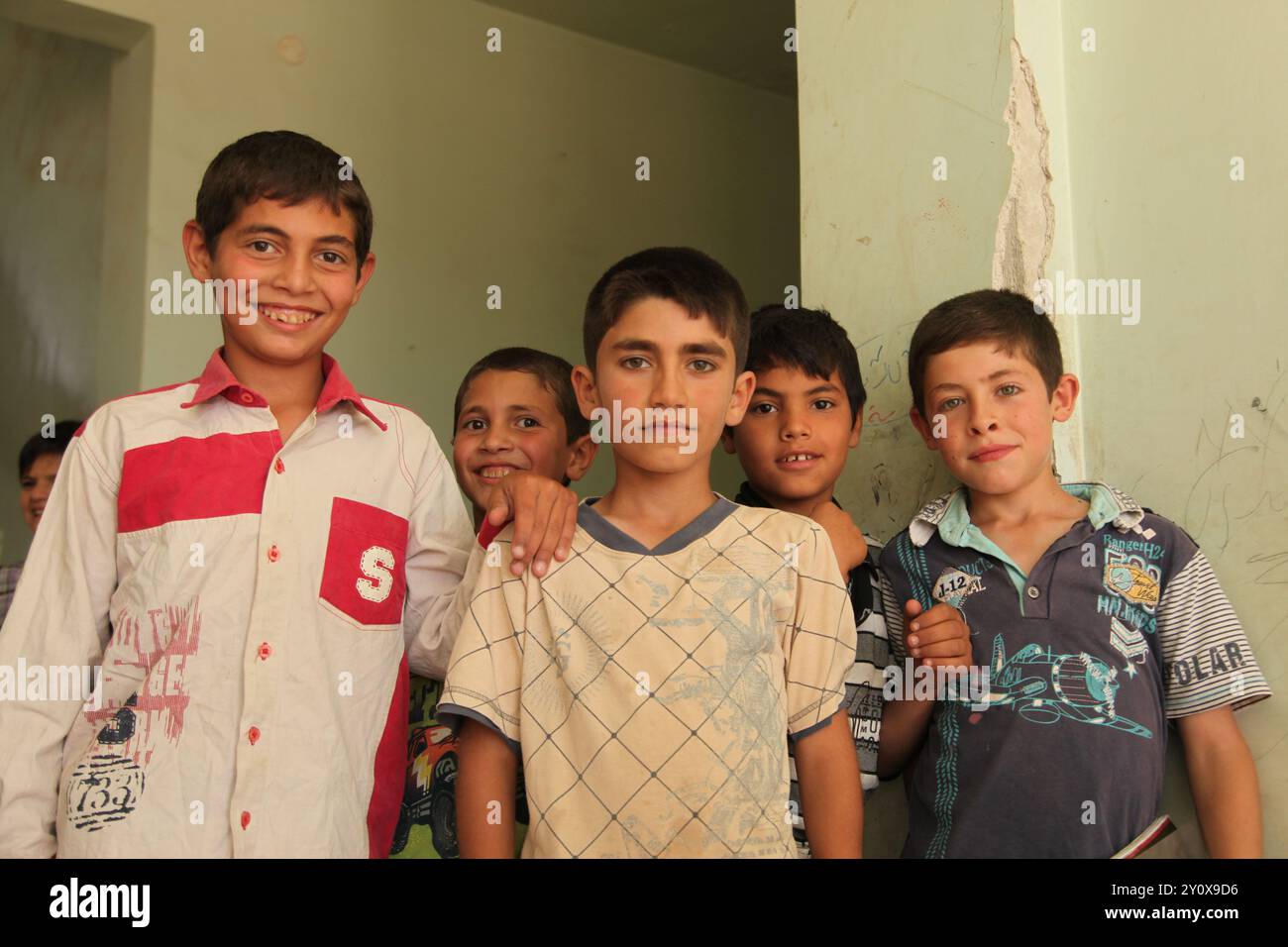 Children attending school. After no schooling for two years, some ...