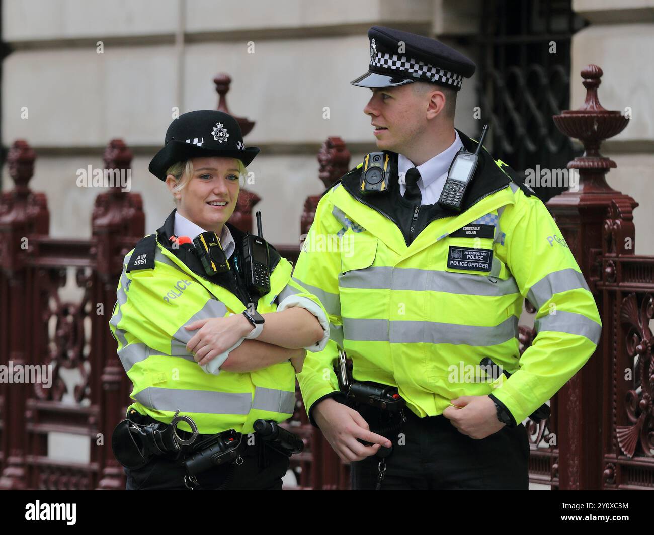 A male and a female police officer patrolling in Westminster, London ...