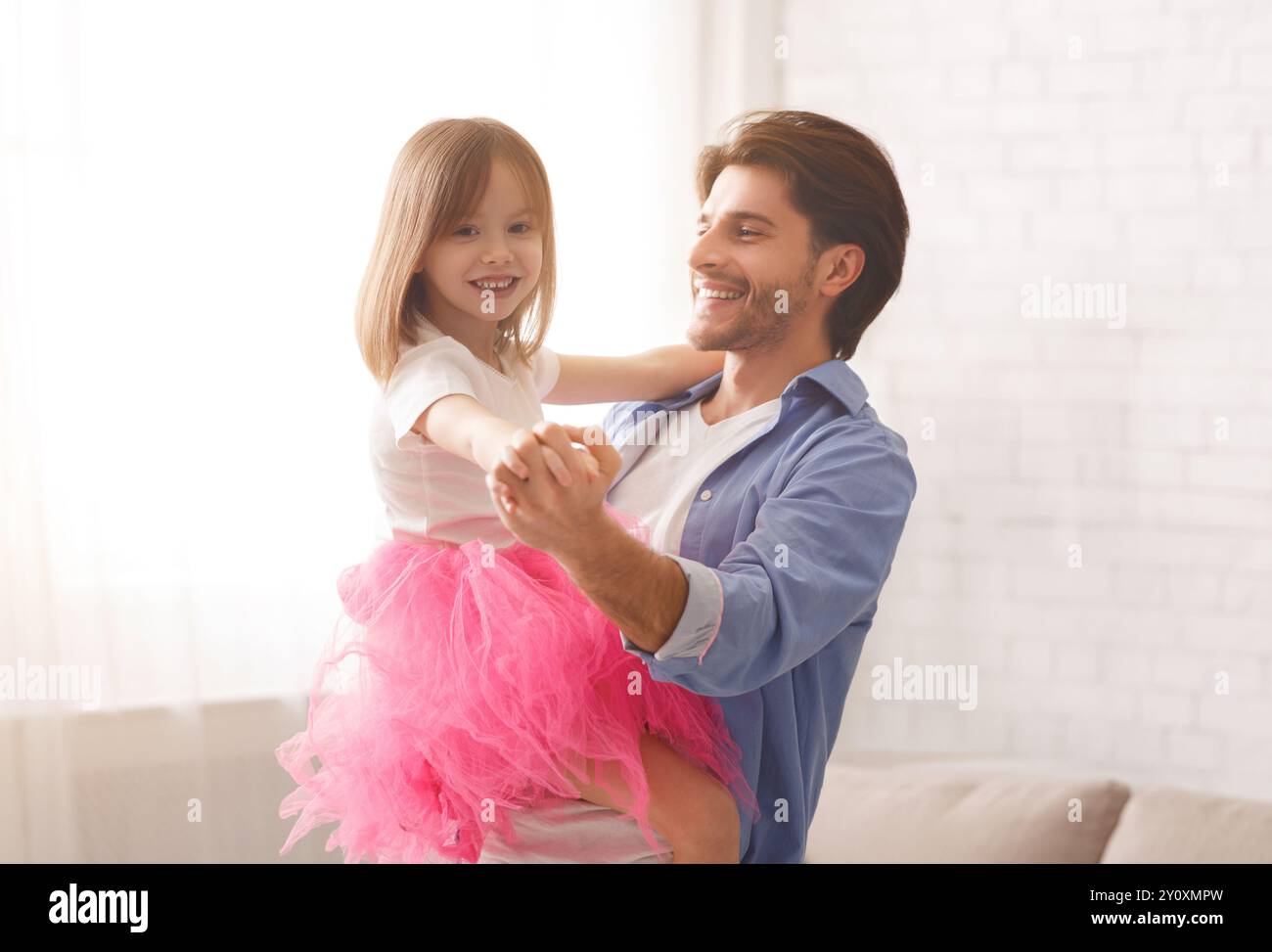 Father and little daughter having dance lesson Stock Photo - Alamy