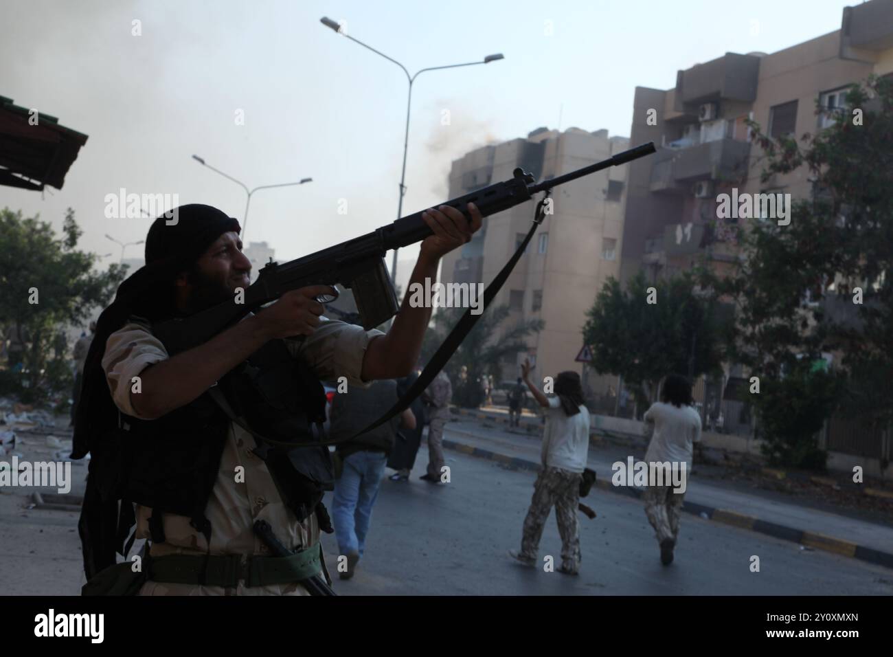 Heavy fighting in Gaddafi's last stronghold Stock Photo - Alamy