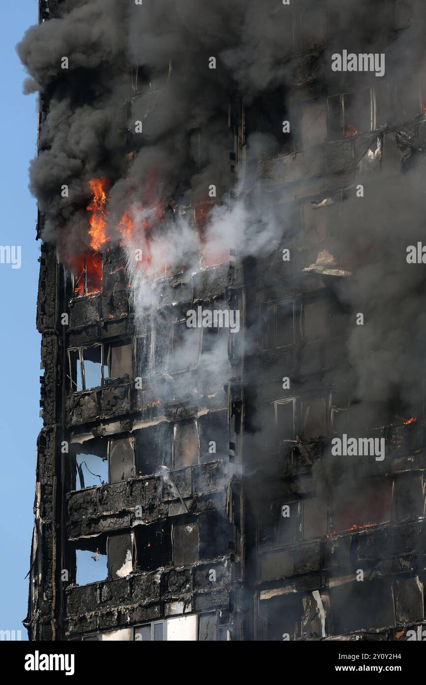 File photo dated 14/07/2017 of smoke billows from a fire that has ...