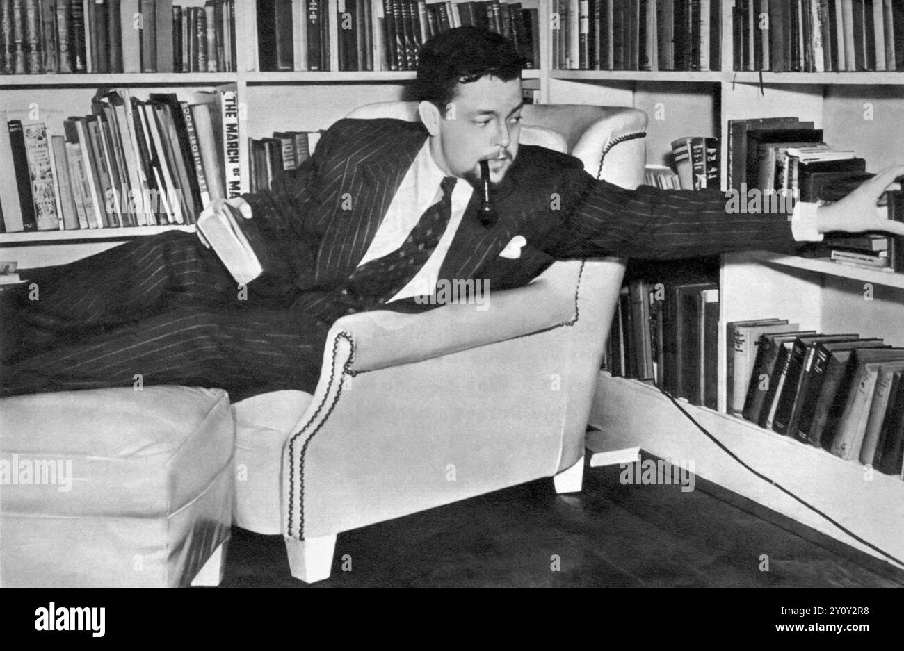 Orson Welles at work in his Hollywood home, 1939. Unknown photographer ...
