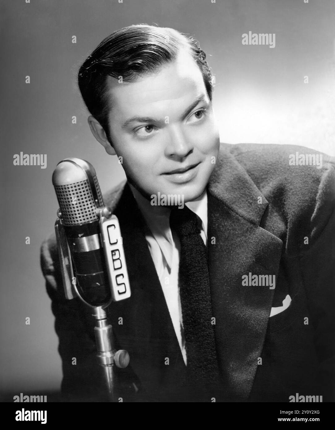 Portrait photograph of Orson Welles, promoting the premiere broadcast ...
