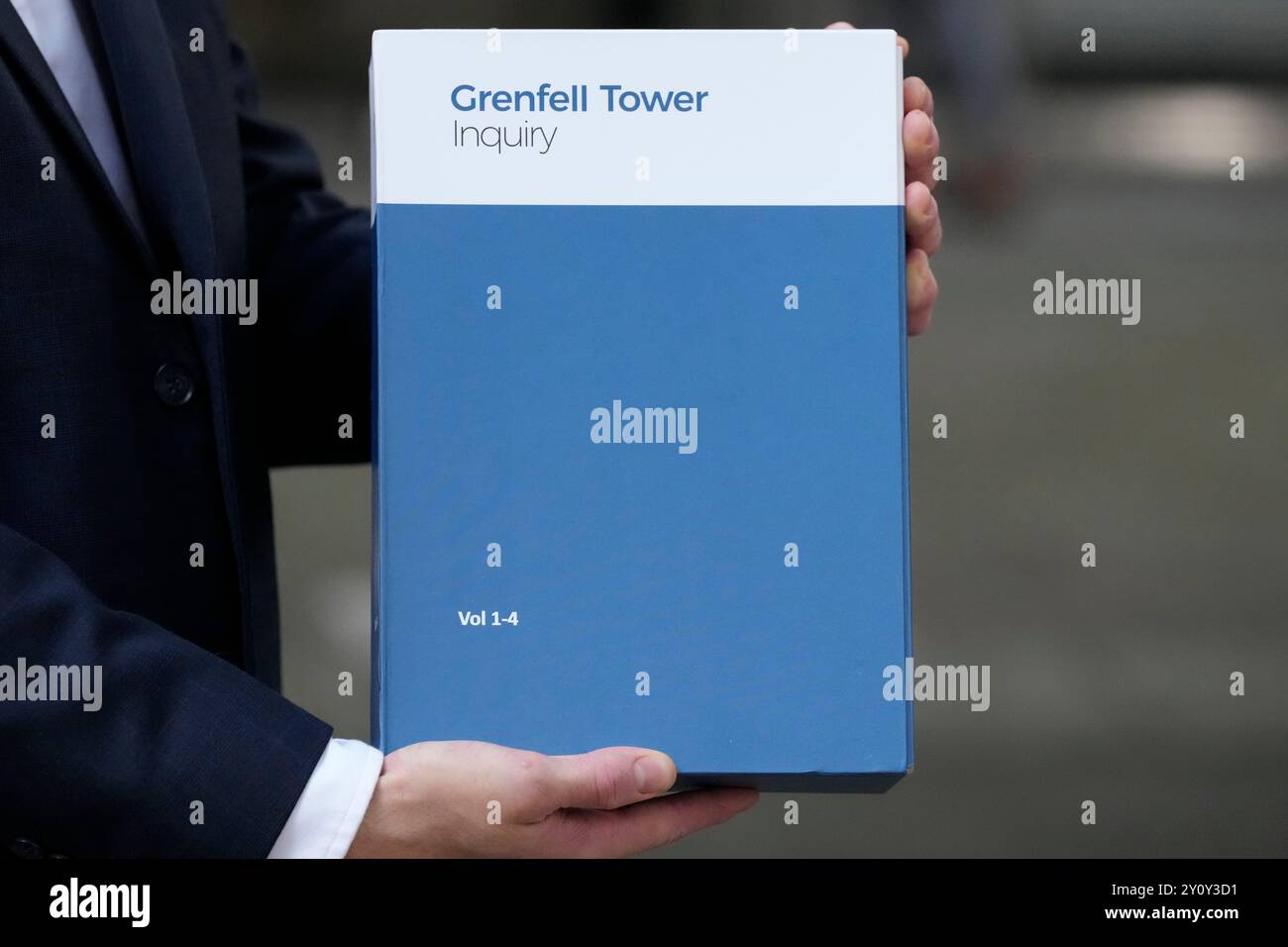 A copy of the Grenfell Tower Inquiry report is shown in London ...