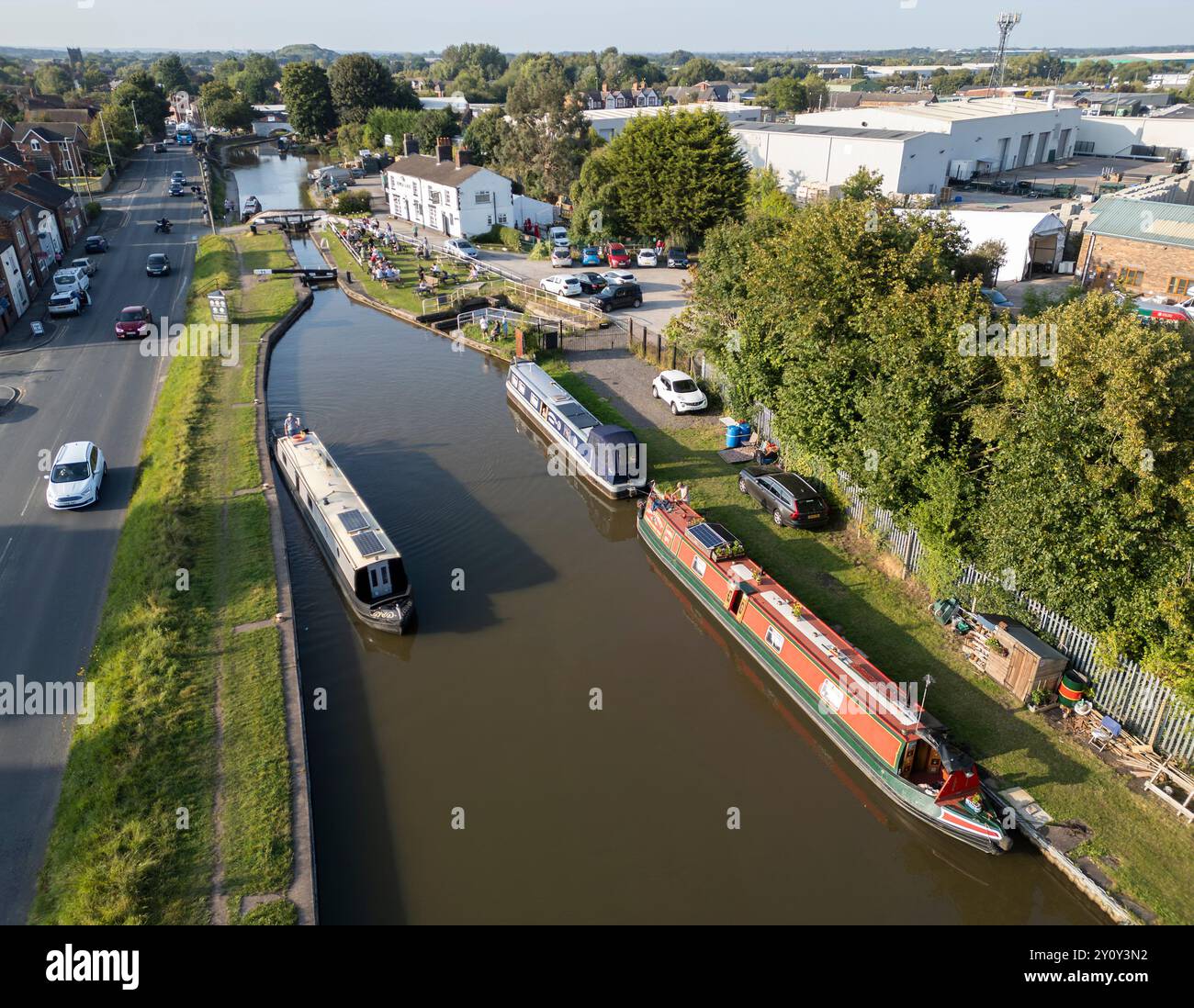 Narrow boats on the Trent and Mersey canal at King's lock, Middlewich ...