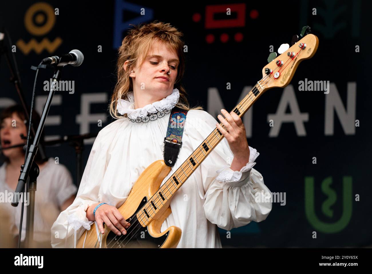 Female bassist singing on stage hi-res stock photography and images - Alamy