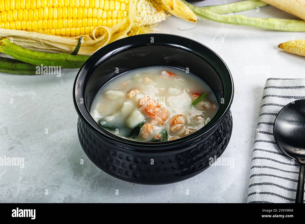 Soup with prawn, spinach and noodle Stock Photo - Alamy