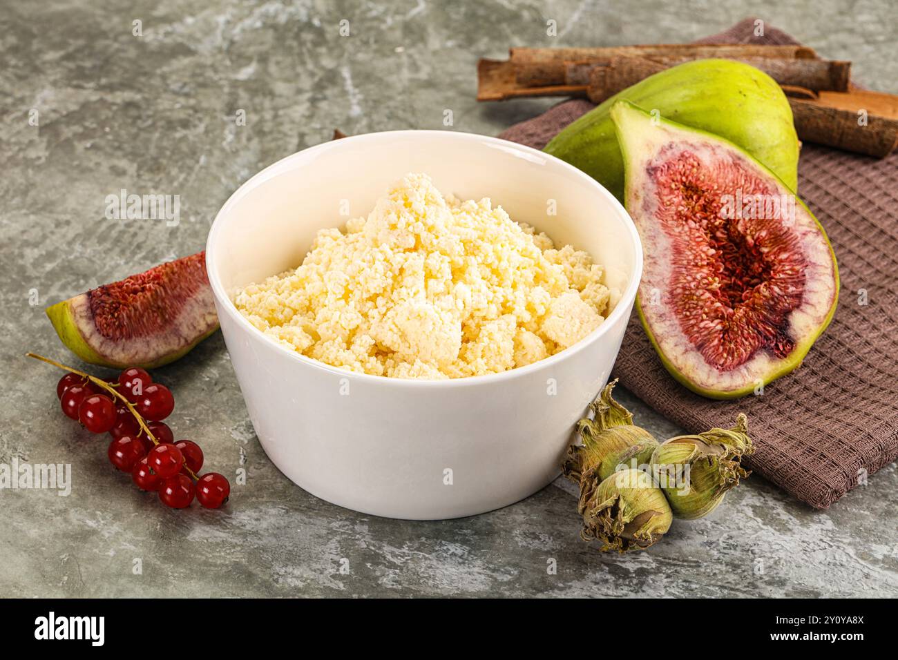 Delicous sheep cottage cheese curd served fig Stock Photo - Alamy