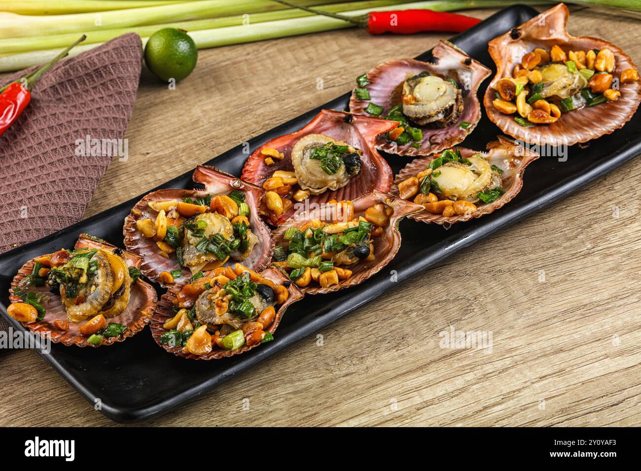 Baked scallops with scalion oil and green onion Stock Photo - Alamy