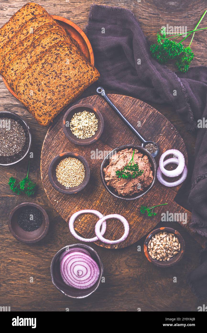 Homemade liver pate with wholewheat bread, onions and herbs Stock Photo ...