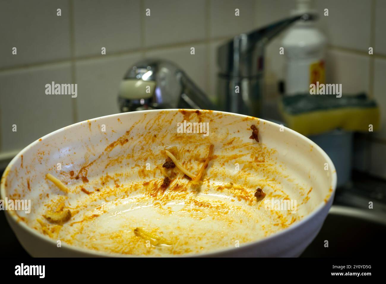 Spaghetti stains on a plastic bowl Stock Photo - Alamy