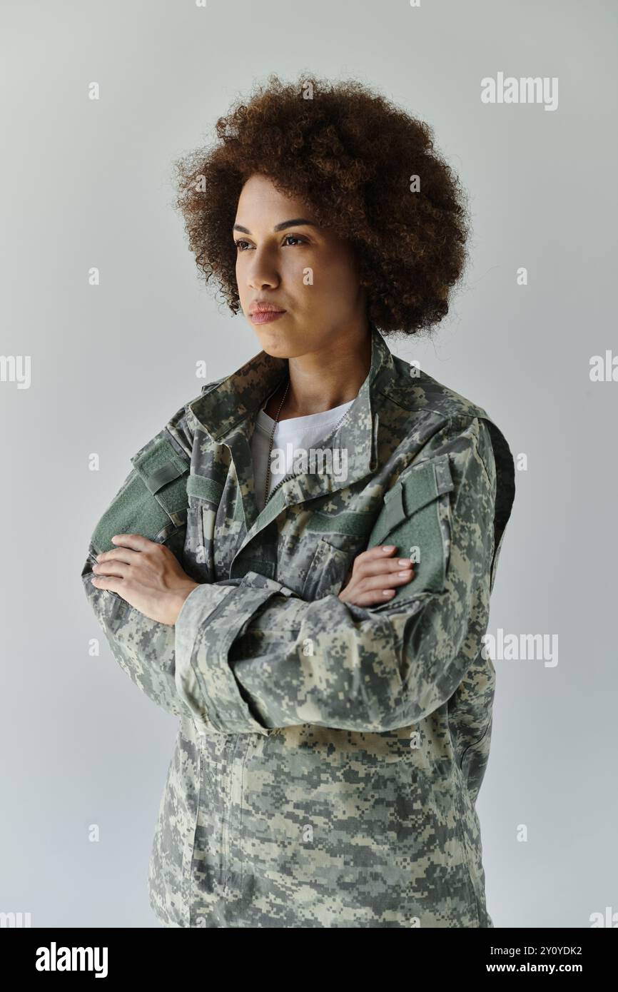 Female soldier is standing proudly in her camouflage uniform hi-res stock photography and images ...