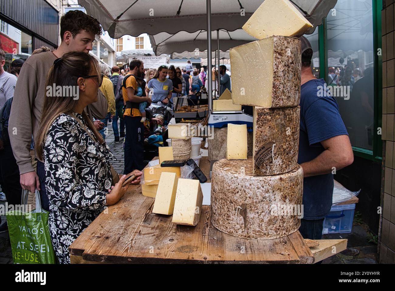 Local Cheese maker on market day in Frome, Somerset in summer Stock ...