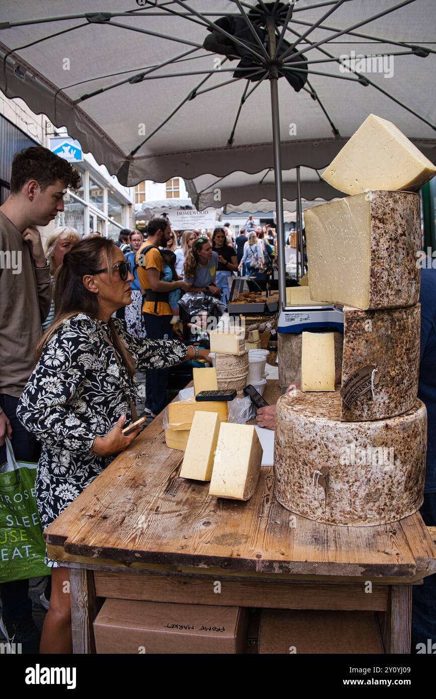 Local Cheese maker on market day in Frome, Somerset in summer Stock ...