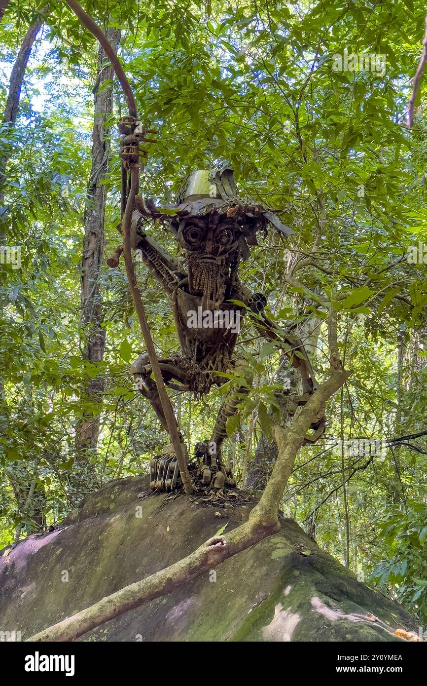 Metal sculpture of Pombero, a Guaraní elf, along a trail in Calilegua ...