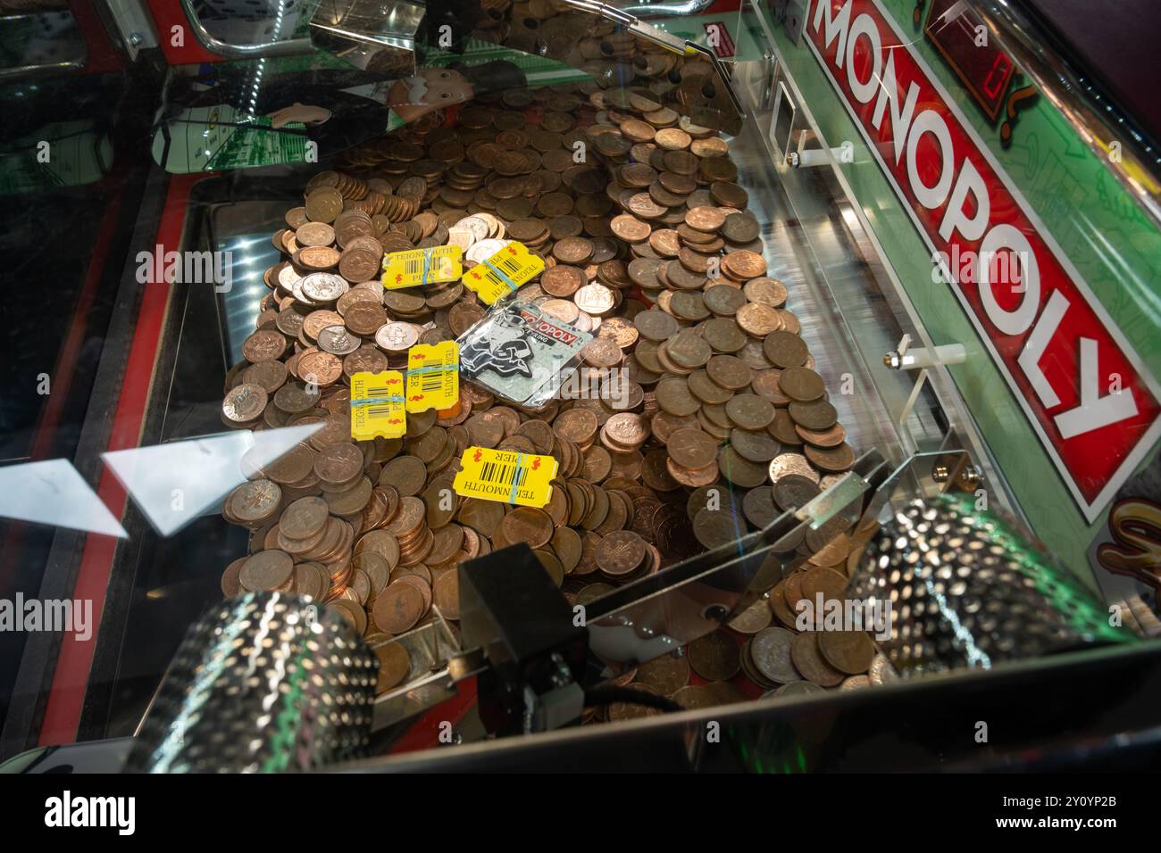 Monopoly tipping point / push a penny arcade game full of copper coins ...