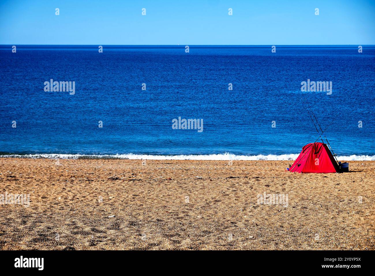 Coastal rod fishing Pebble Beach Jurassic Coast Dorset England Showing ...