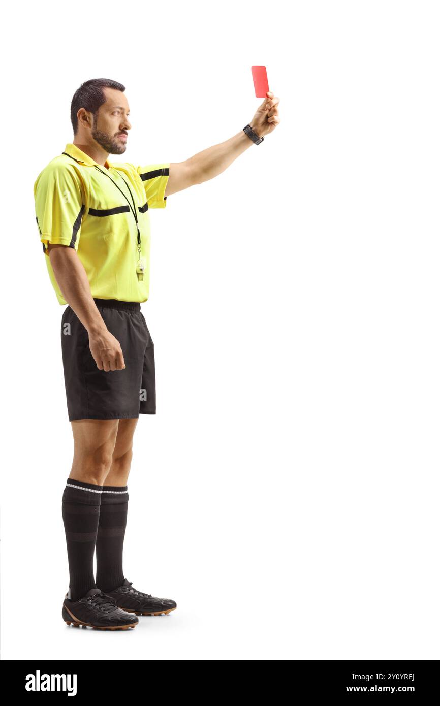 Full length shot of a football referee holding a red card isolated on ...