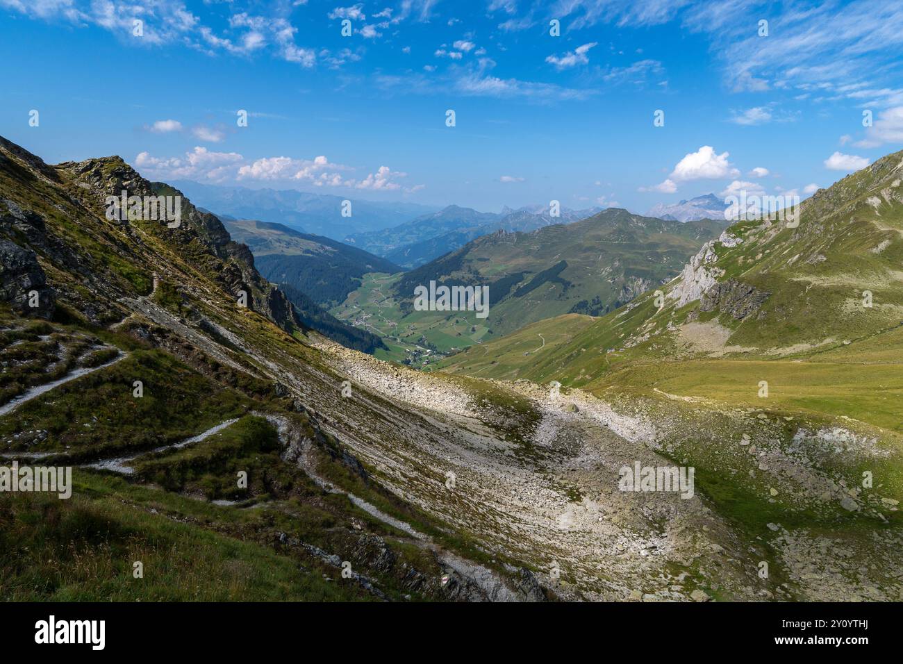 panoramic view, hike over steep Swiss mountains, border with stony ...