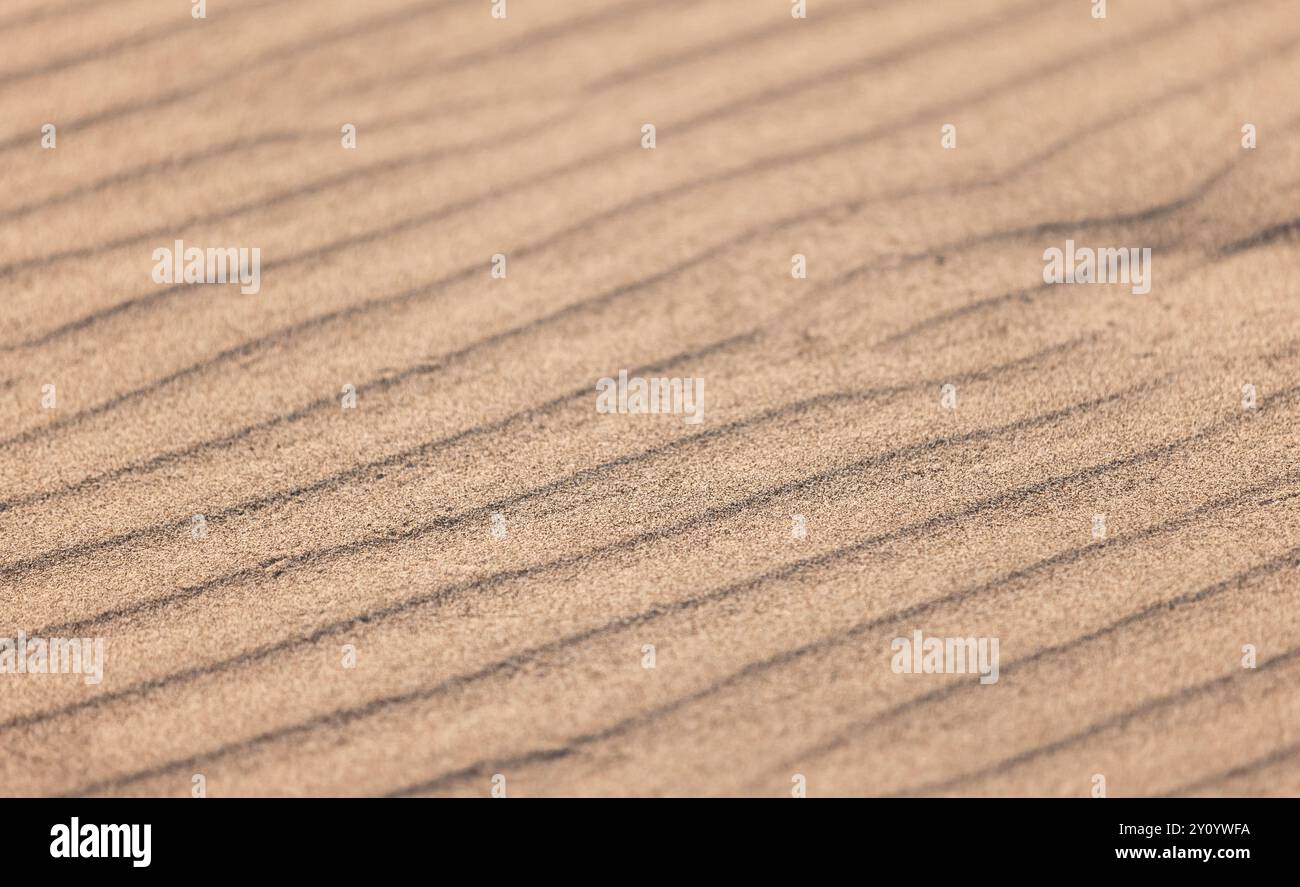 Sand waves pattern, natural background photo with selective soft focus ...