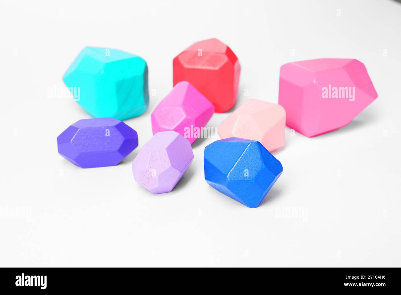 Many colorful balancing stones on white background Stock Photo - Alamy