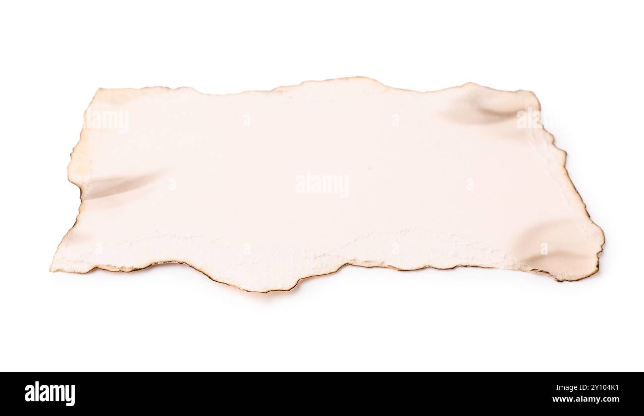 Piece of old paper with dark burnt borders isolated on white Stock ...