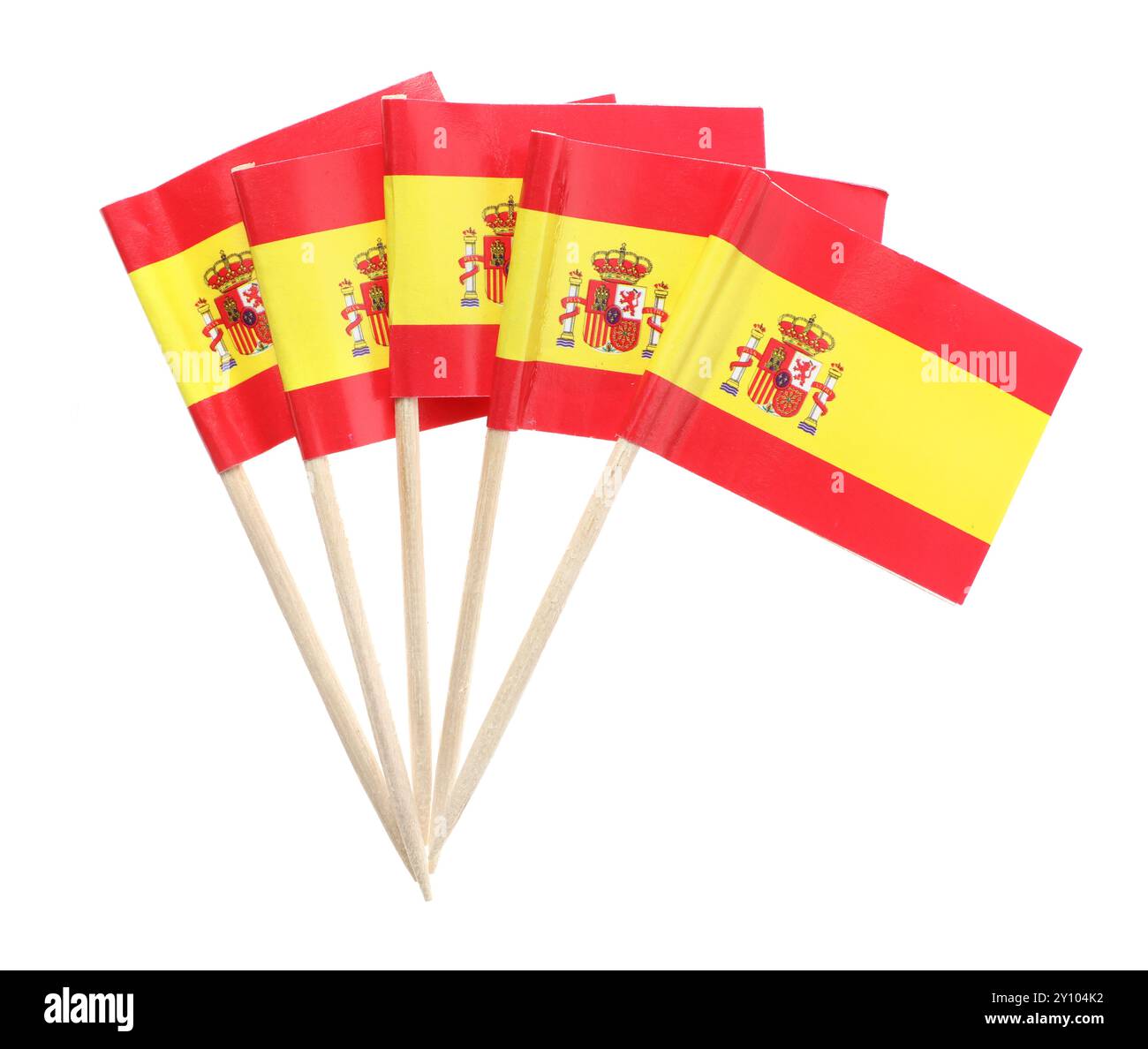 Small paper flags of Spain isolated on white Stock Photo - Alamy