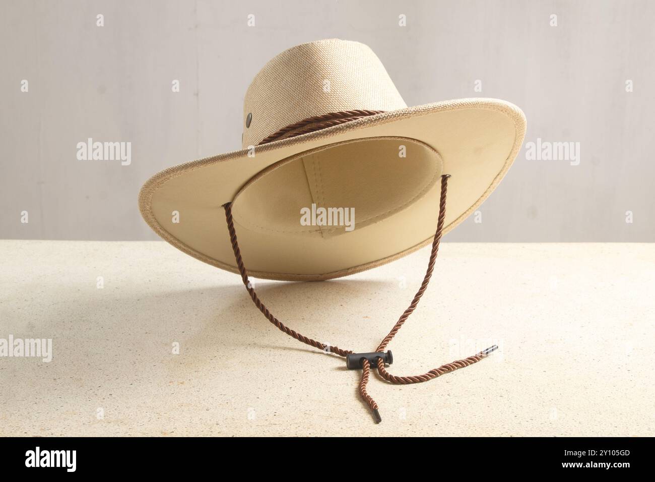 Close-up photo of a man's cowboy hat with chin strap front view, the ...