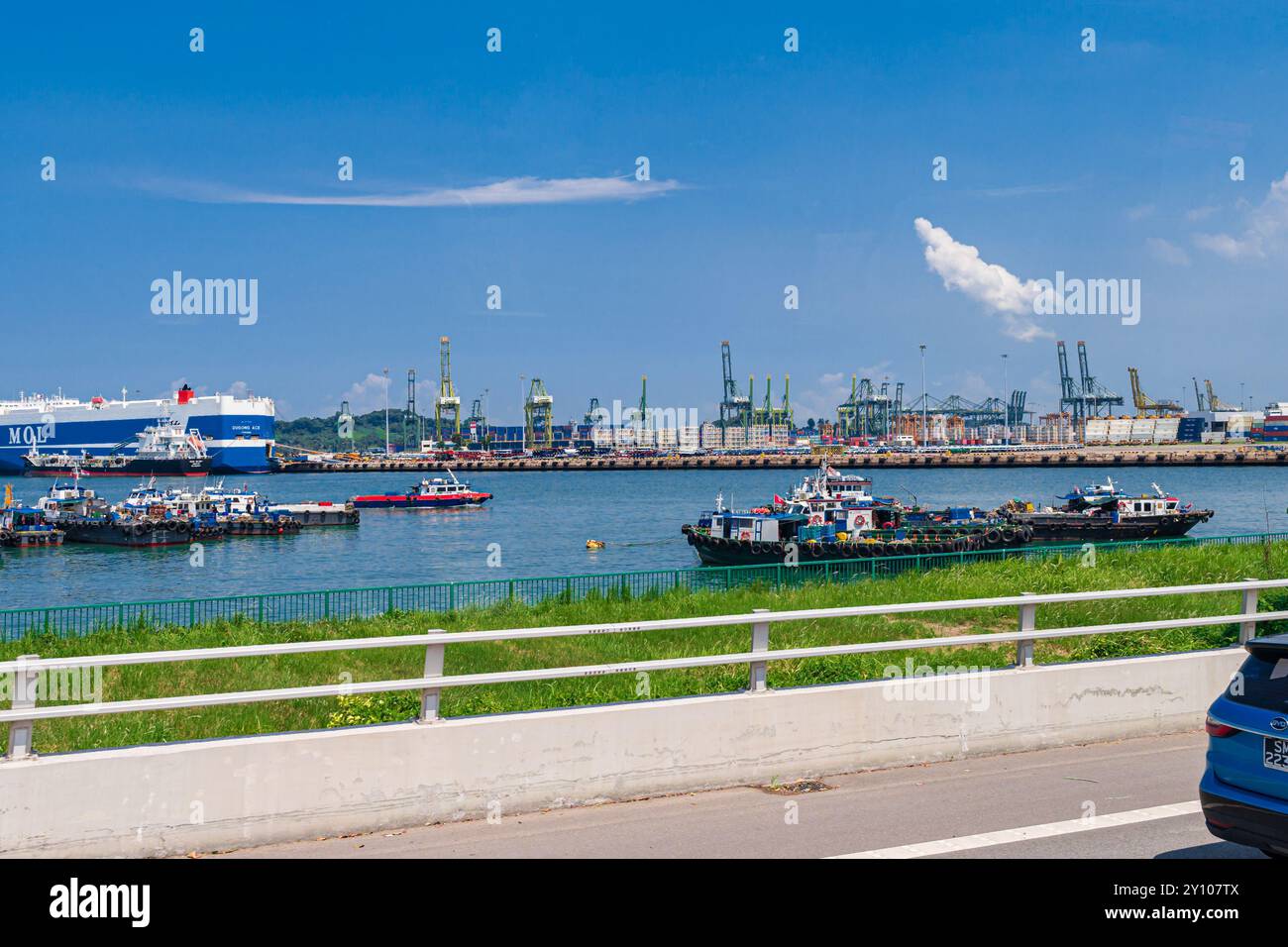 Singapore - Jun 13 2024: Aerial view of container terminal, cranes and ...