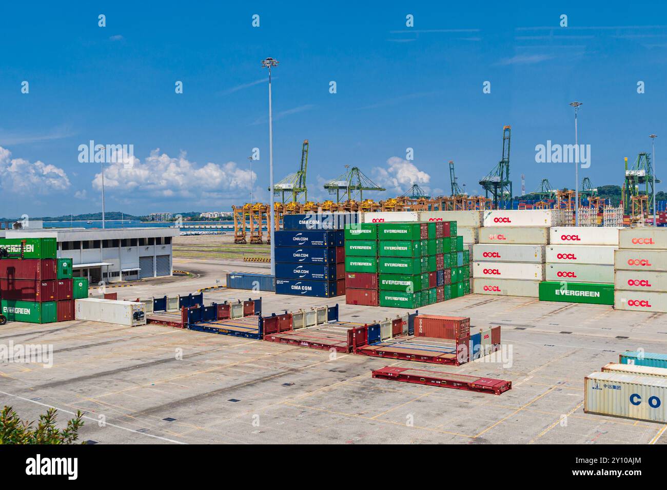 Singapore - Jun 13 2024: Aerial view of container terminal, cranes and ...